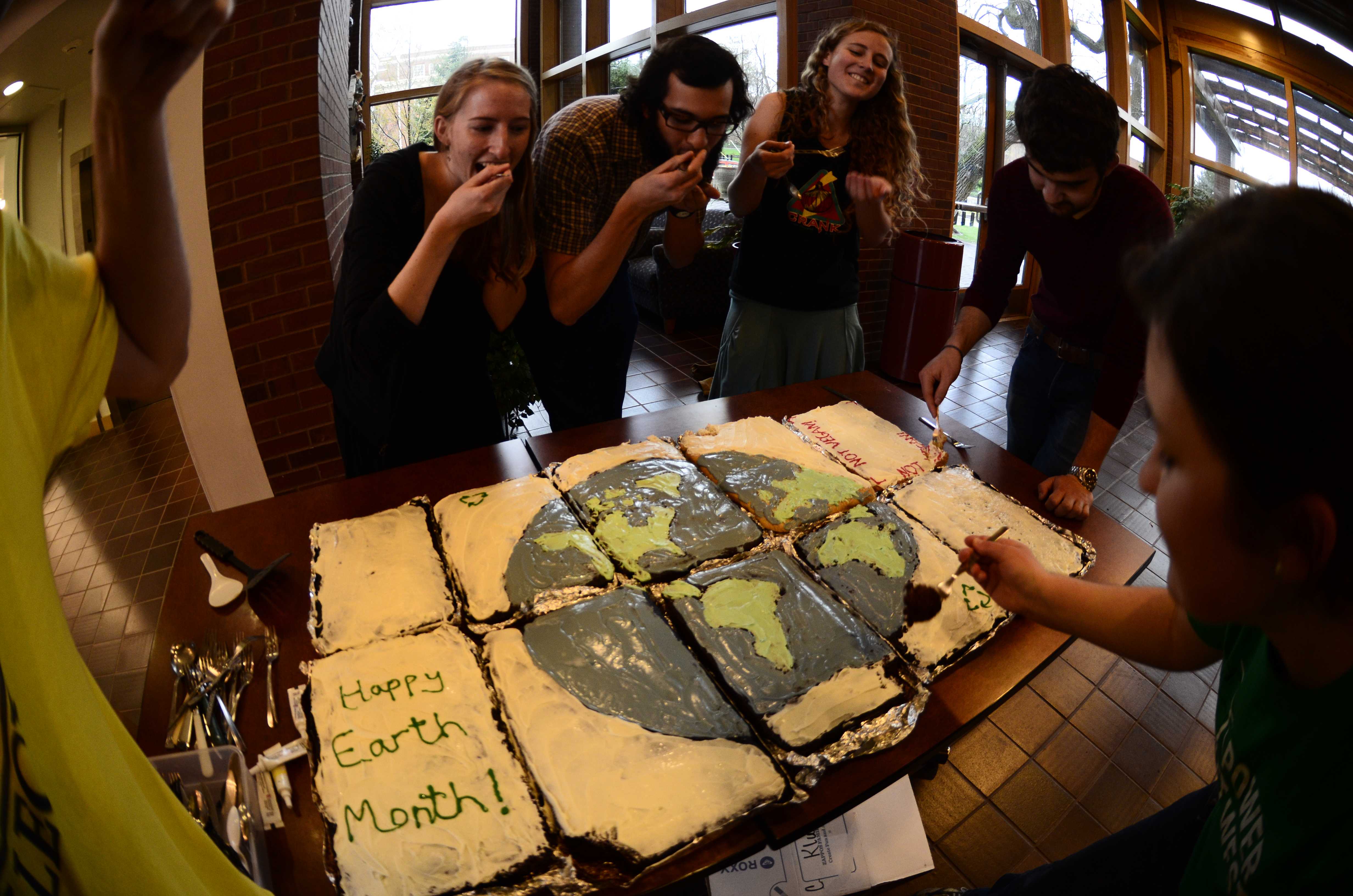 Photos: Outhouse celebrates Earth Month with cake – Whitman Wire